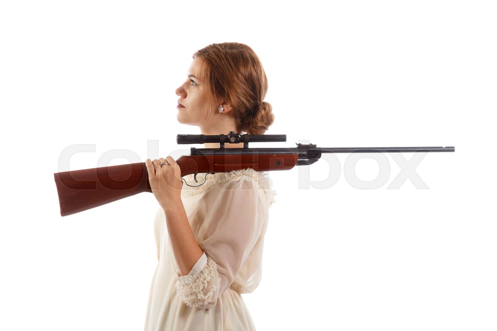 Lady holding a rifle | Stock image | Colourbox