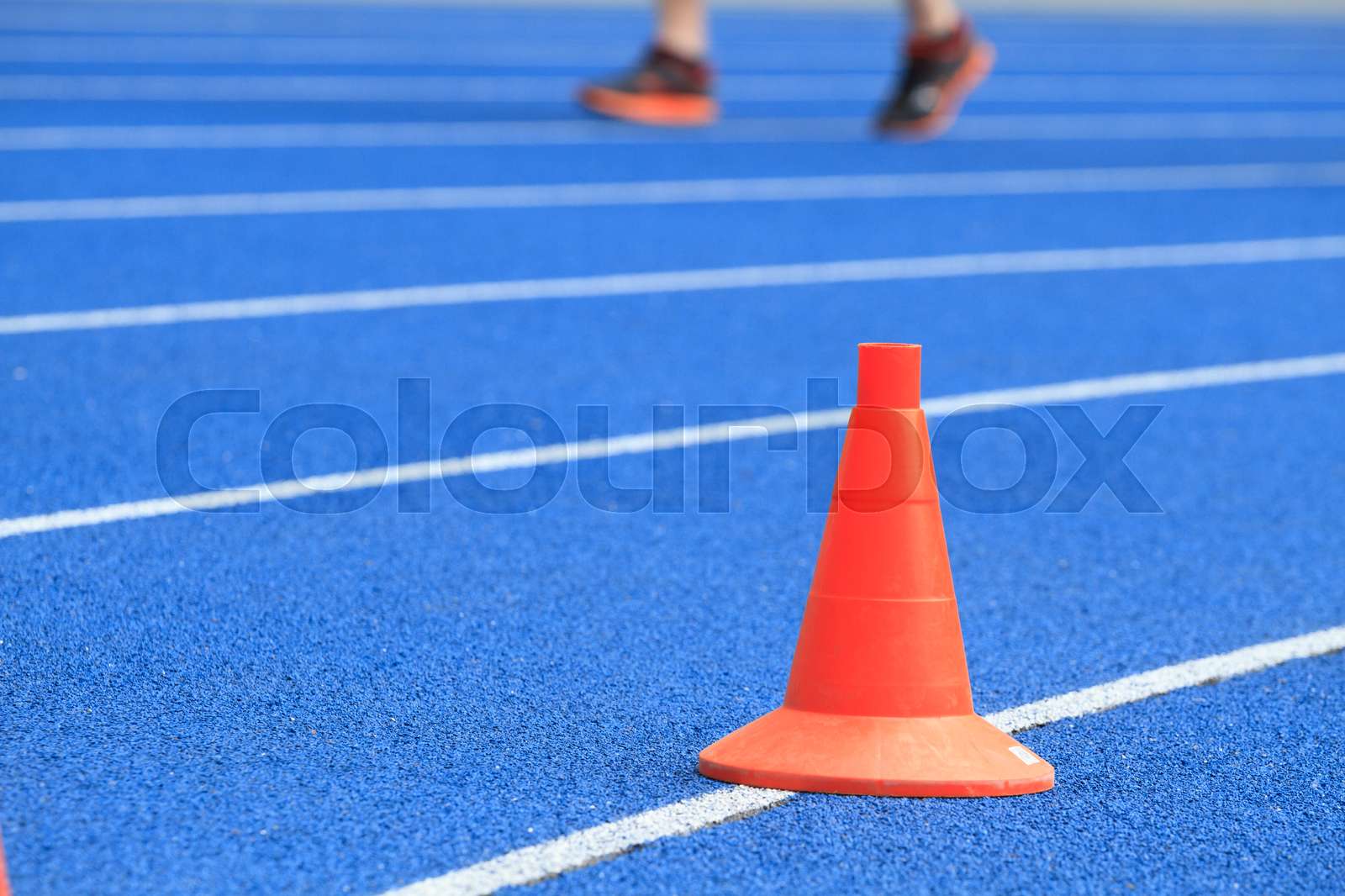 People running in stadium | Stock image | Colourbox