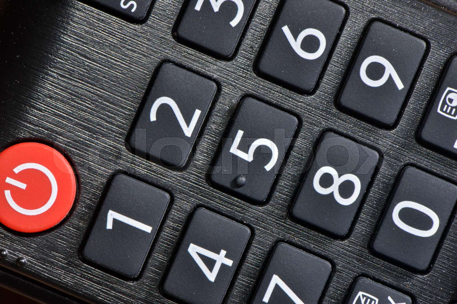 Macro of remote button number and power | Stock image | Colourbox