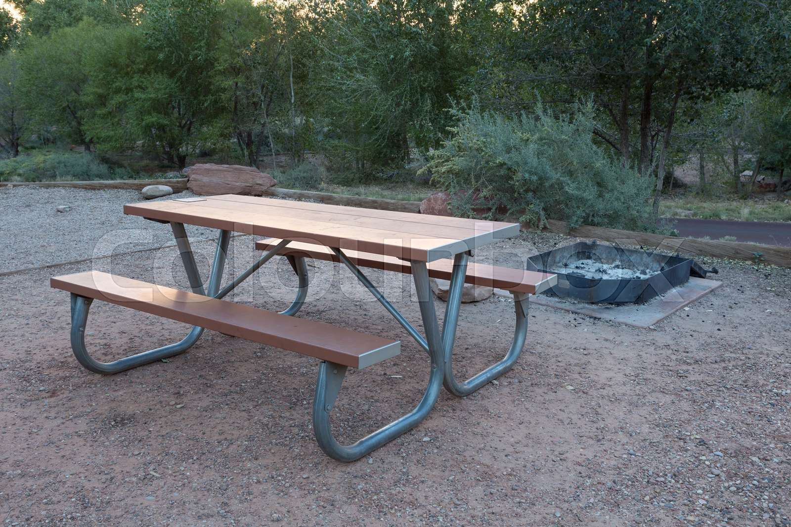 Wooden bench in camping area | Stock image | Colourbox