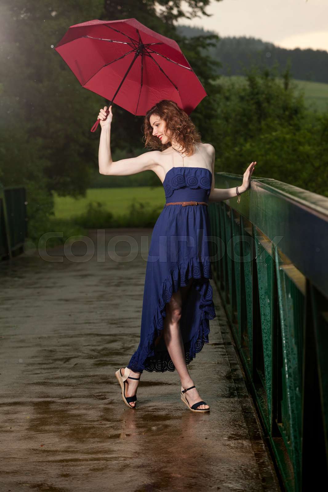 Red Umbrella In Rain