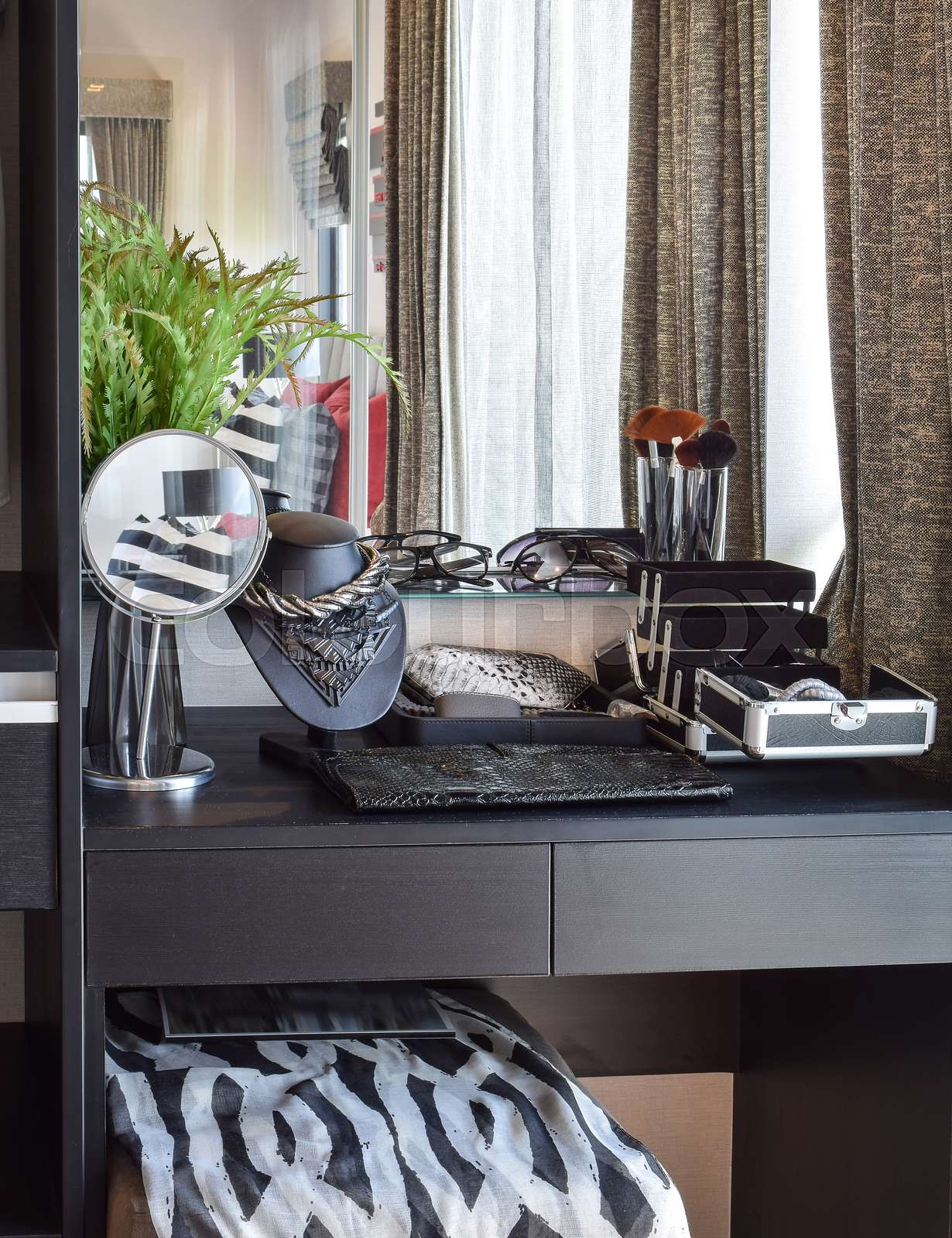 black wooden dressing table with accessories at home | Stock image ...
