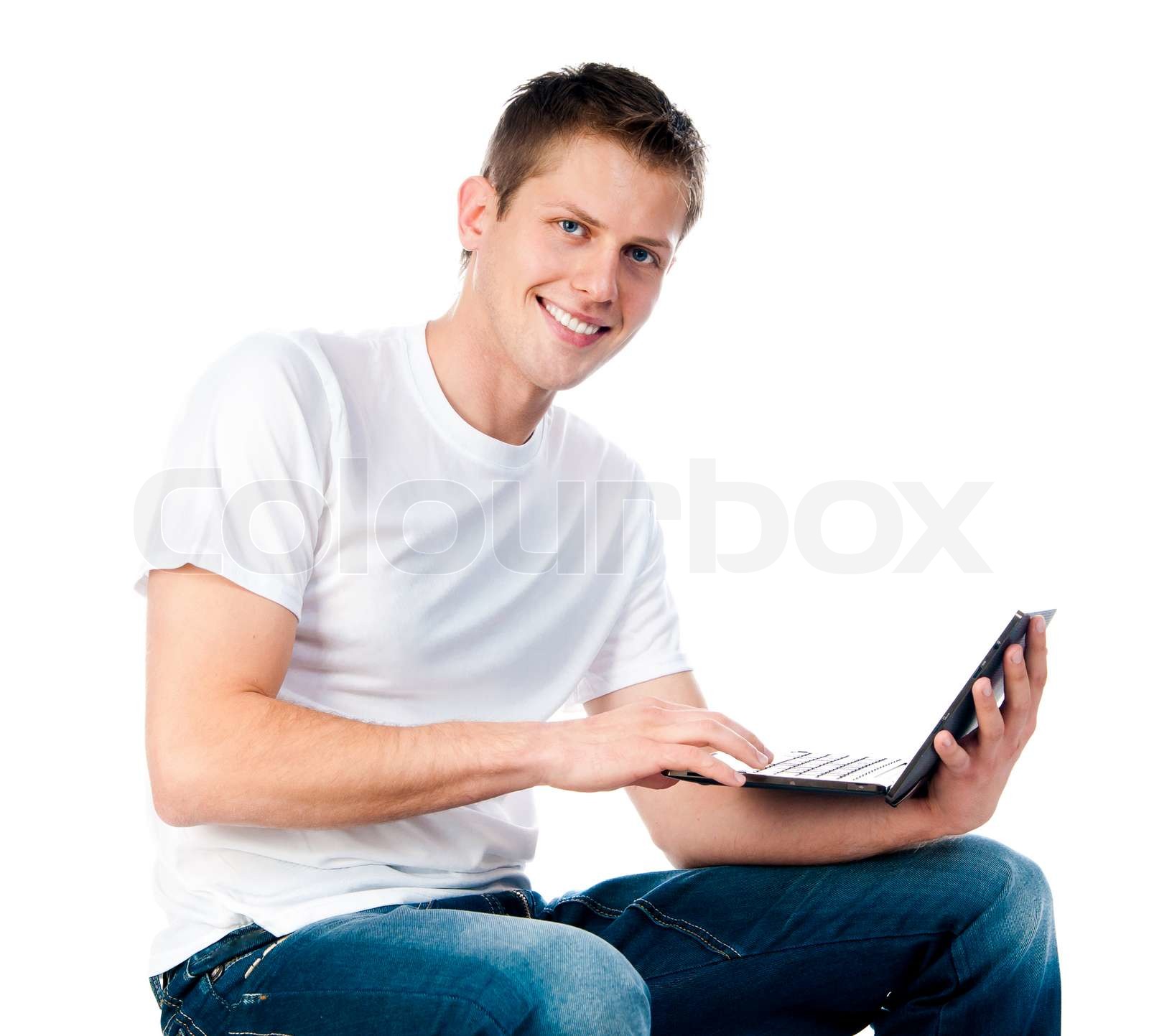 smart guy with a laptop isolated on white | Stock image | Colourbox