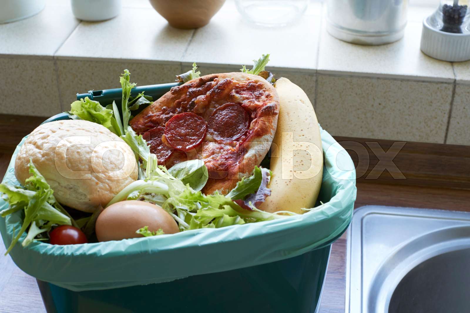 Fresh Food Waste In Recycling Bin At Home | Stock image | Colourbox