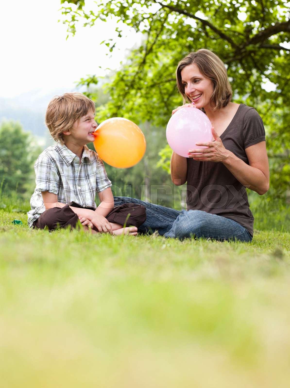 Mother And Son With Balloons Stock Image Colourbox
