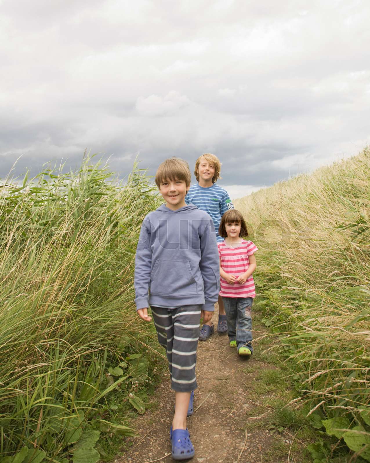 Children walking down path | Stock image | Colourbox