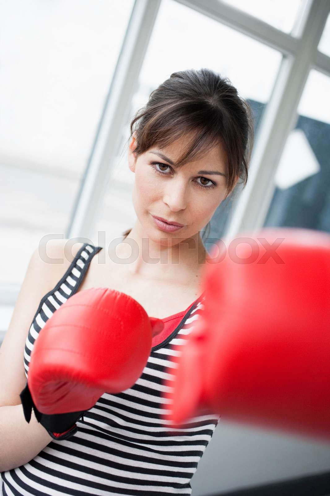 Woman boxing to camera | Stock image | Colourbox