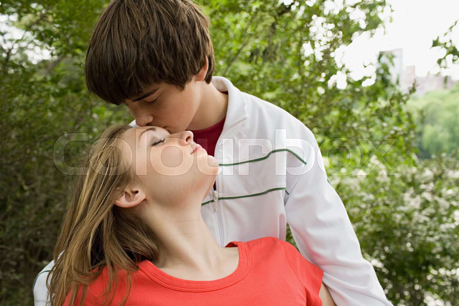 Teenage couple kissing | Stock image | Colourbox