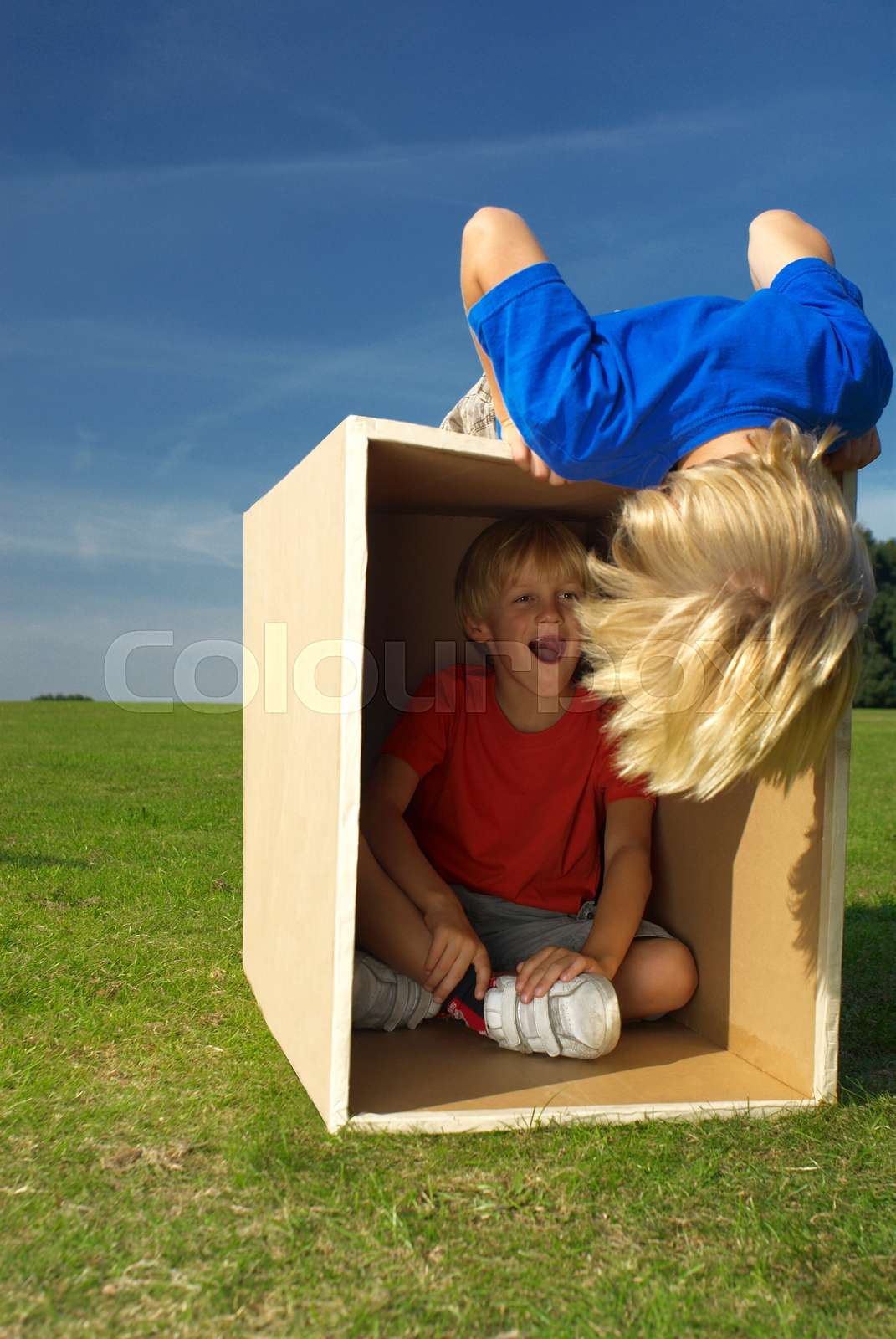 boy in box shouting | Stock image | Colourbox