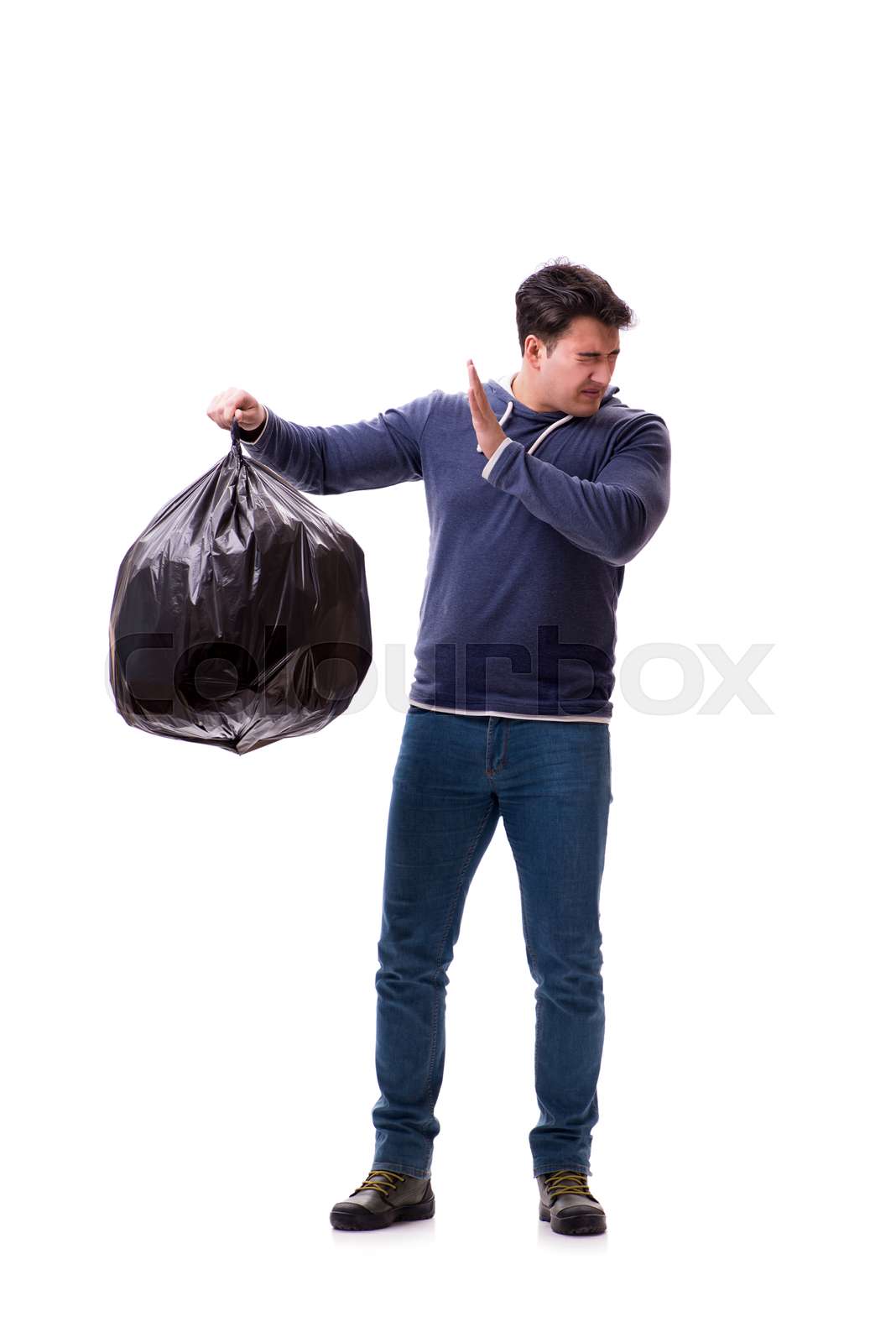 Man with garbage sack isolated on white | Stock image | Colourbox