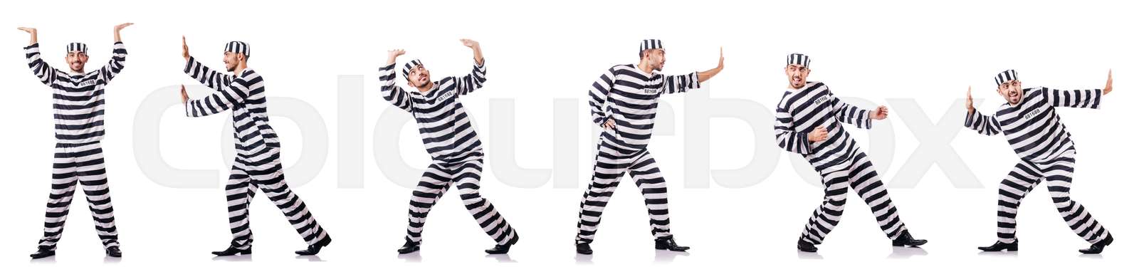 Convict criminal in striped uniform | Stock image | Colourbox