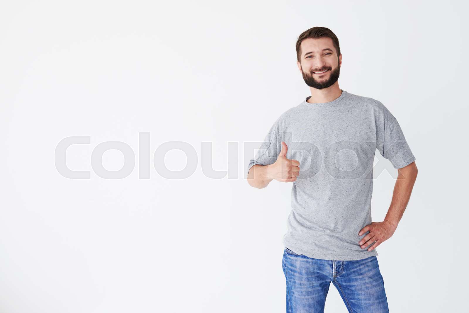 Happy standing guy | Stock image | Colourbox