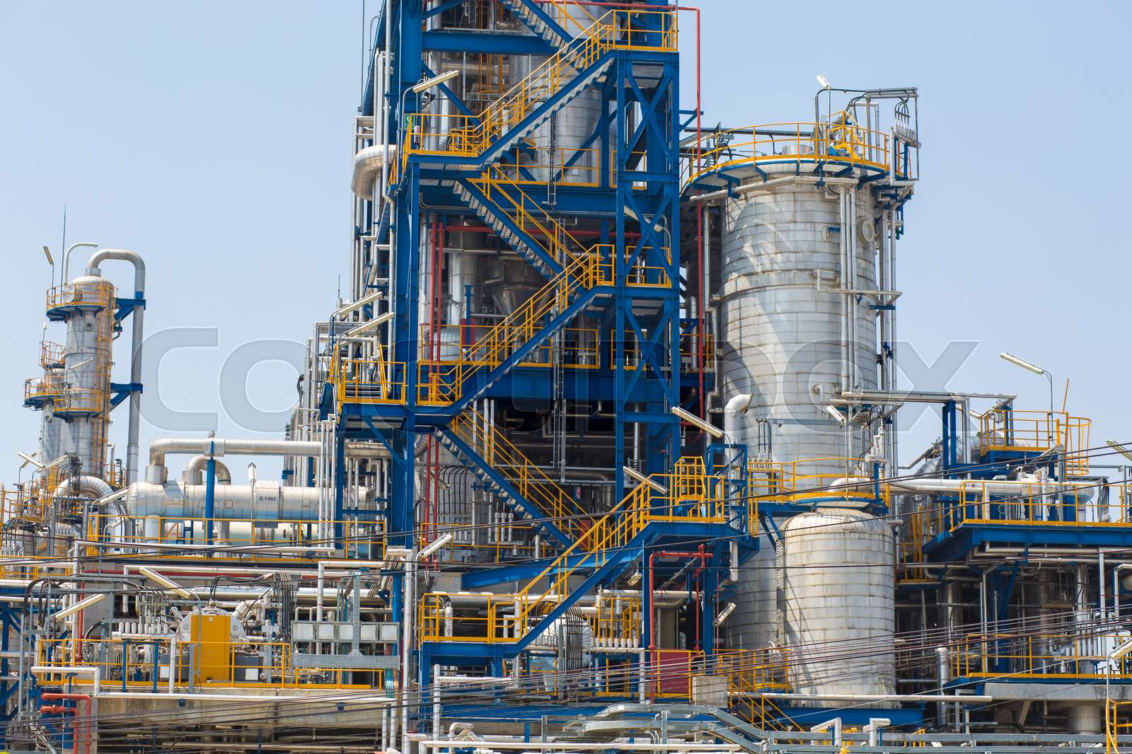 Big structure of oil refinery plant in day time | Stock image | Colourbox