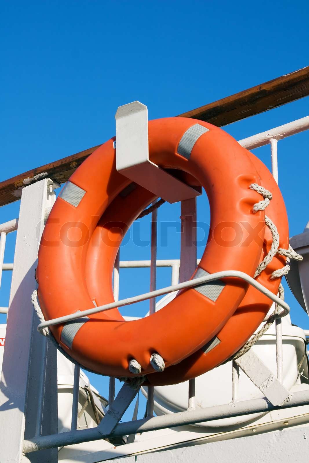Lifebuoys on the passenger deck of the ship | Stock image | Colourbox