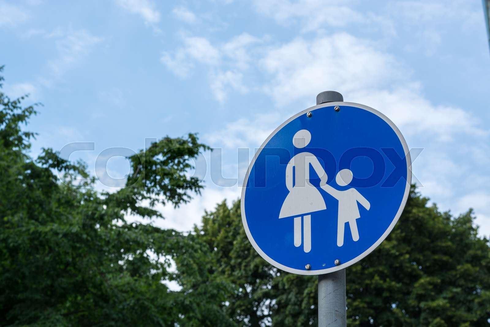 A German warning sign for families | Stock Bild | Colourbox