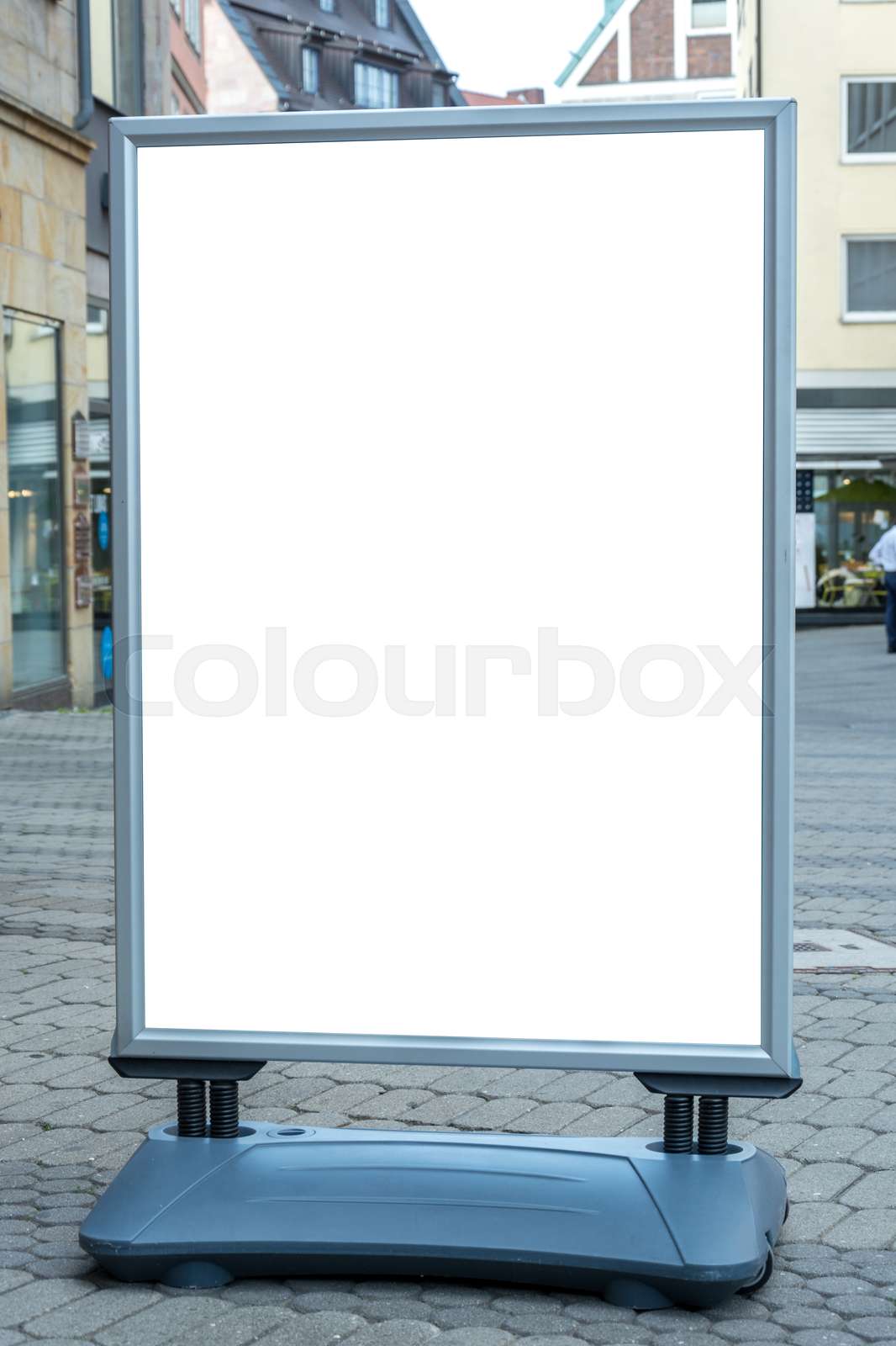 Blank ad space sign isolated in the street | Stock image | Colourbox