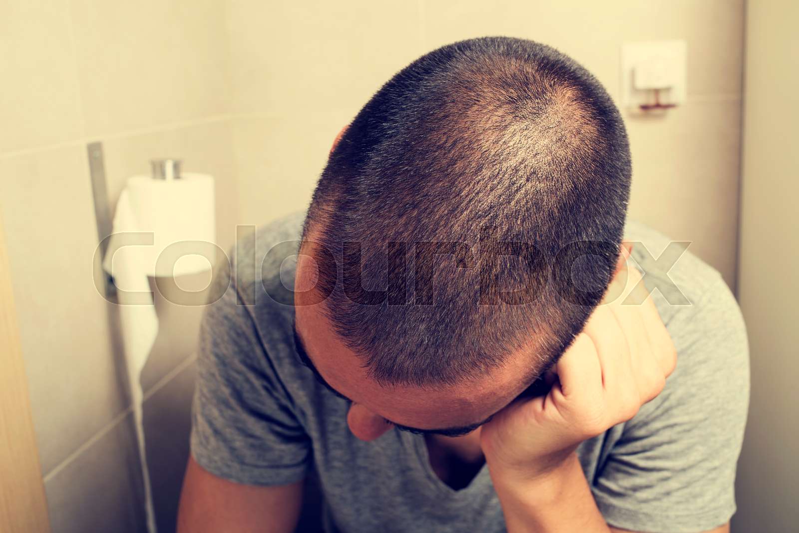 man in the toilet | Stock image | Colourbox