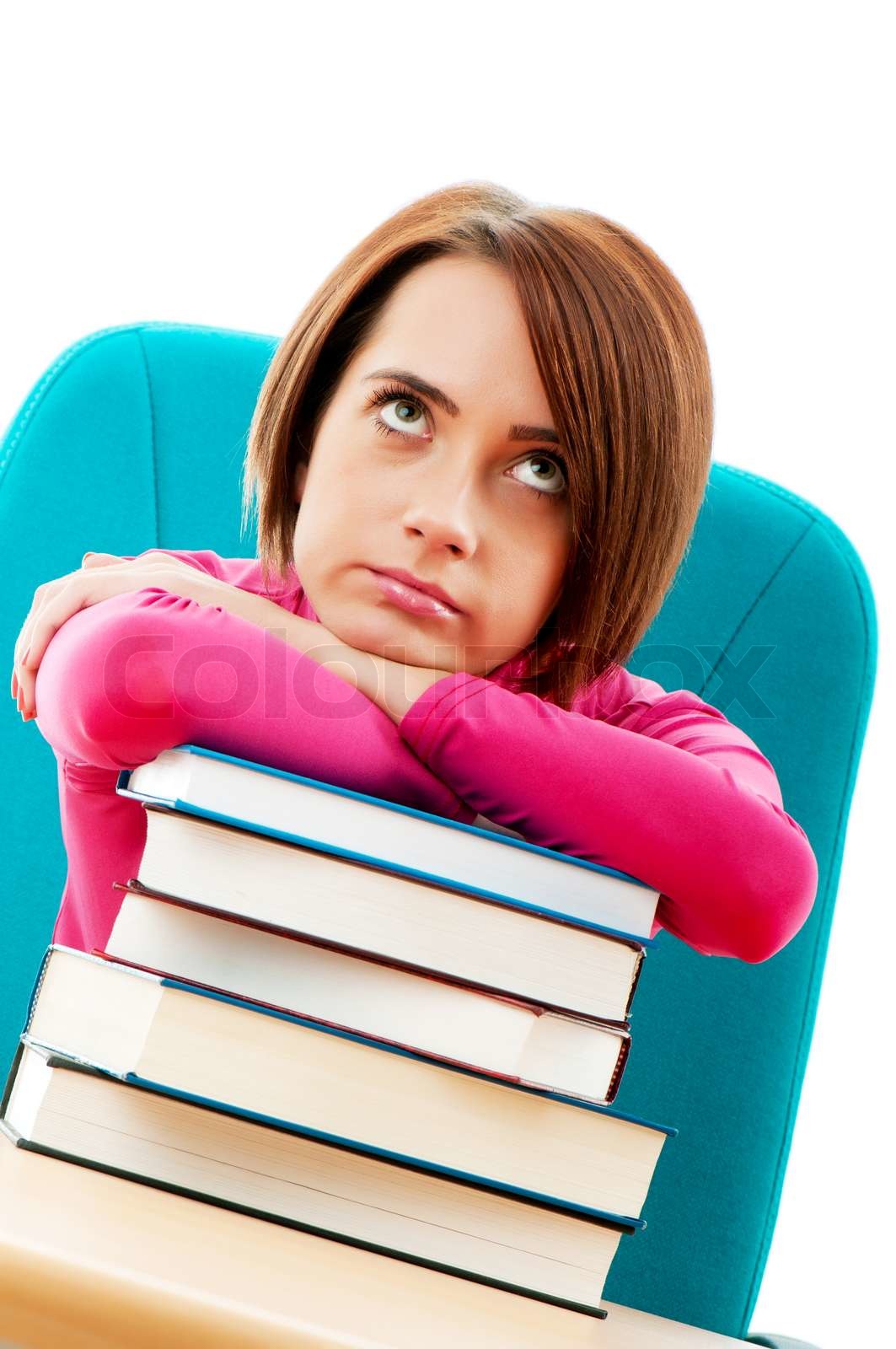 Junge Studentin mit vielen studieren Bücher | Stock Bild | Colourbox