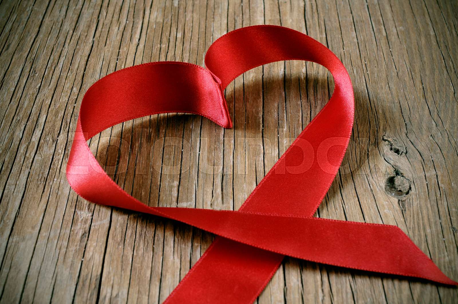 red ribbon forming a heart | Stock image | Colourbox