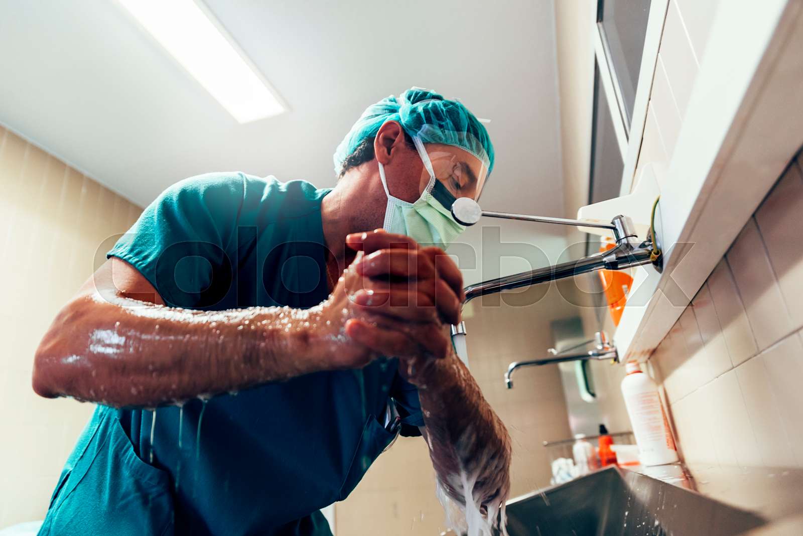 Doctor Washing Hands Before Operating. | Stock image | Colourbox