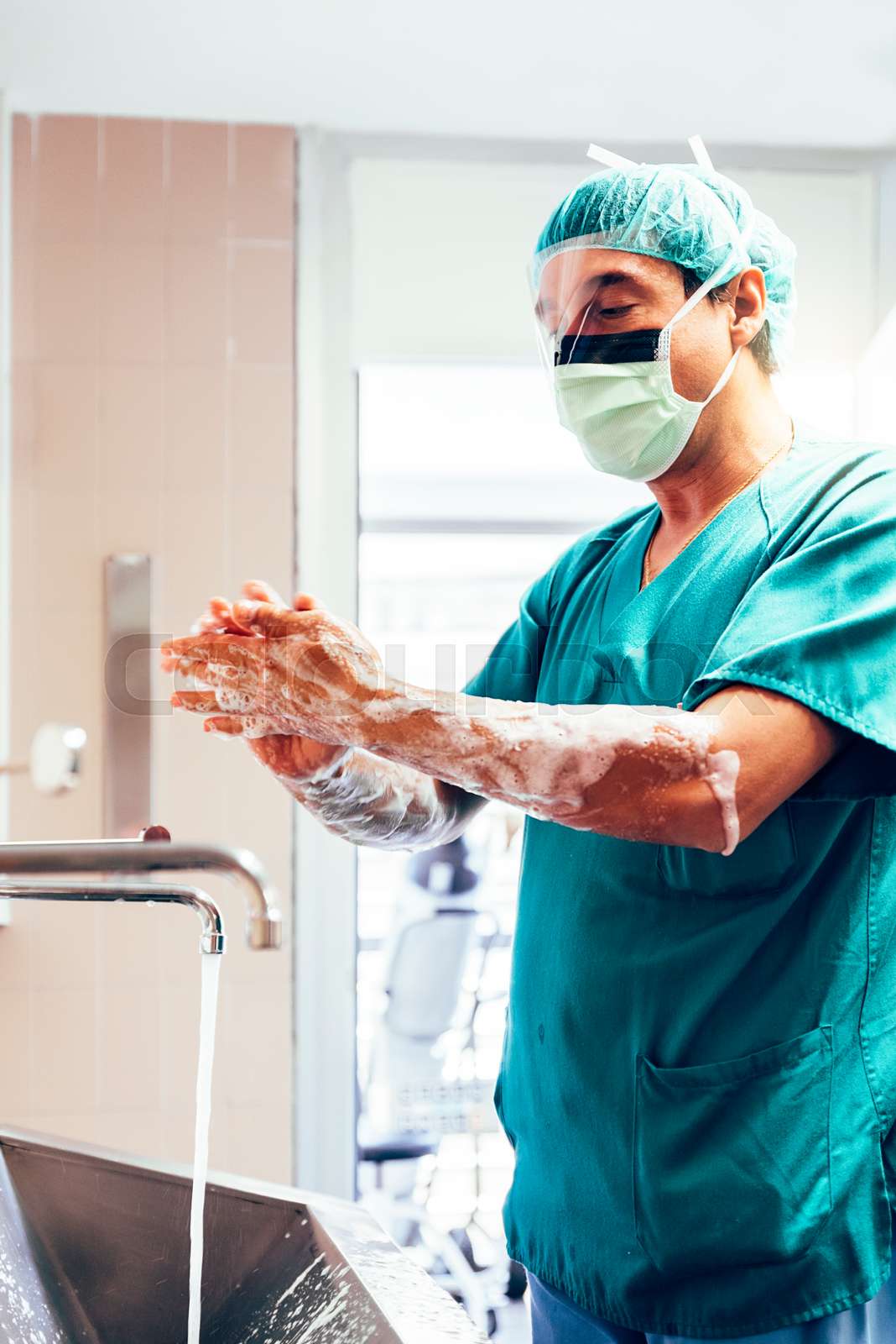 Doctor Washing Hands Before Operating. | Stock image | Colourbox