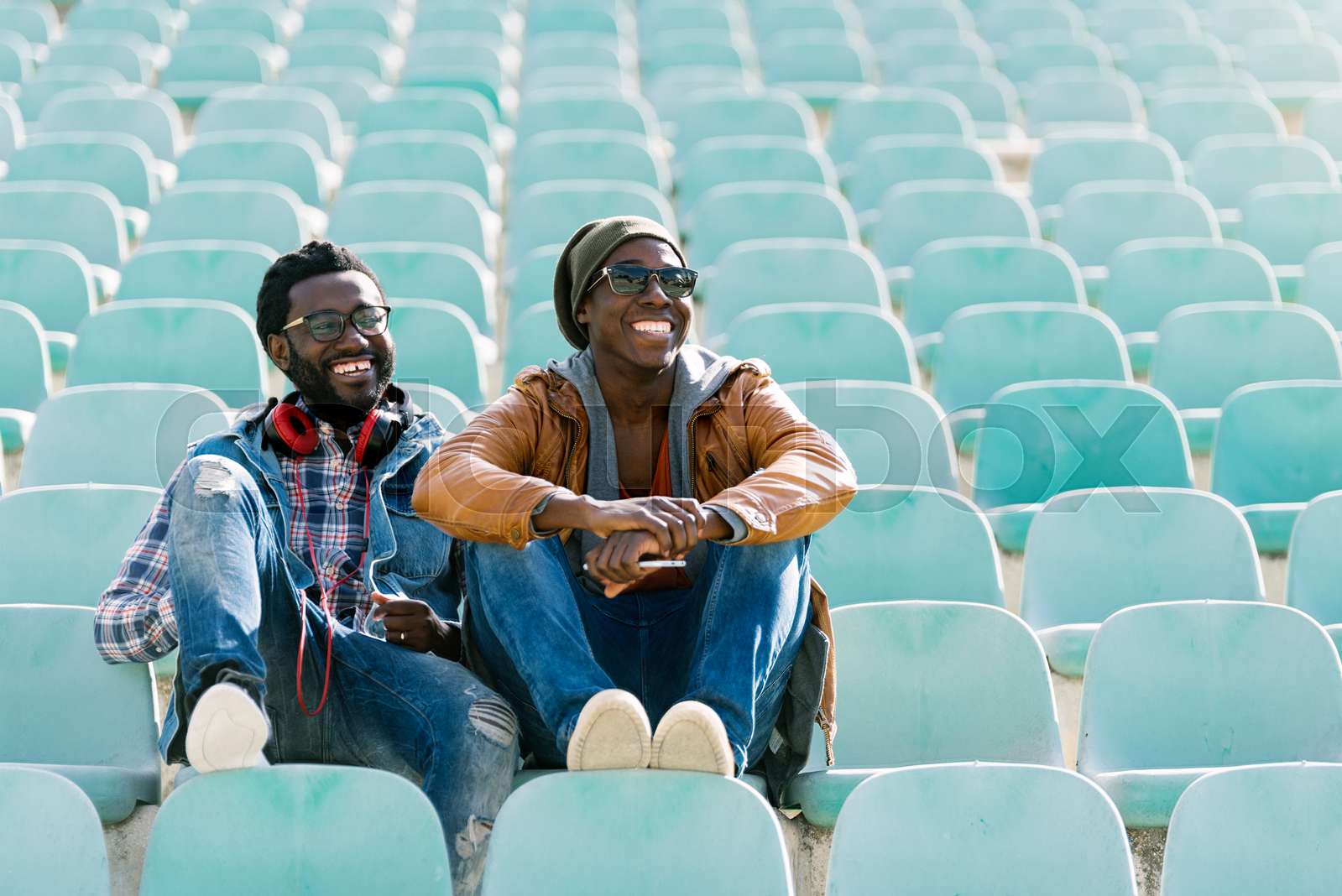 Two black race friends having fun. | Stock image | Colourbox