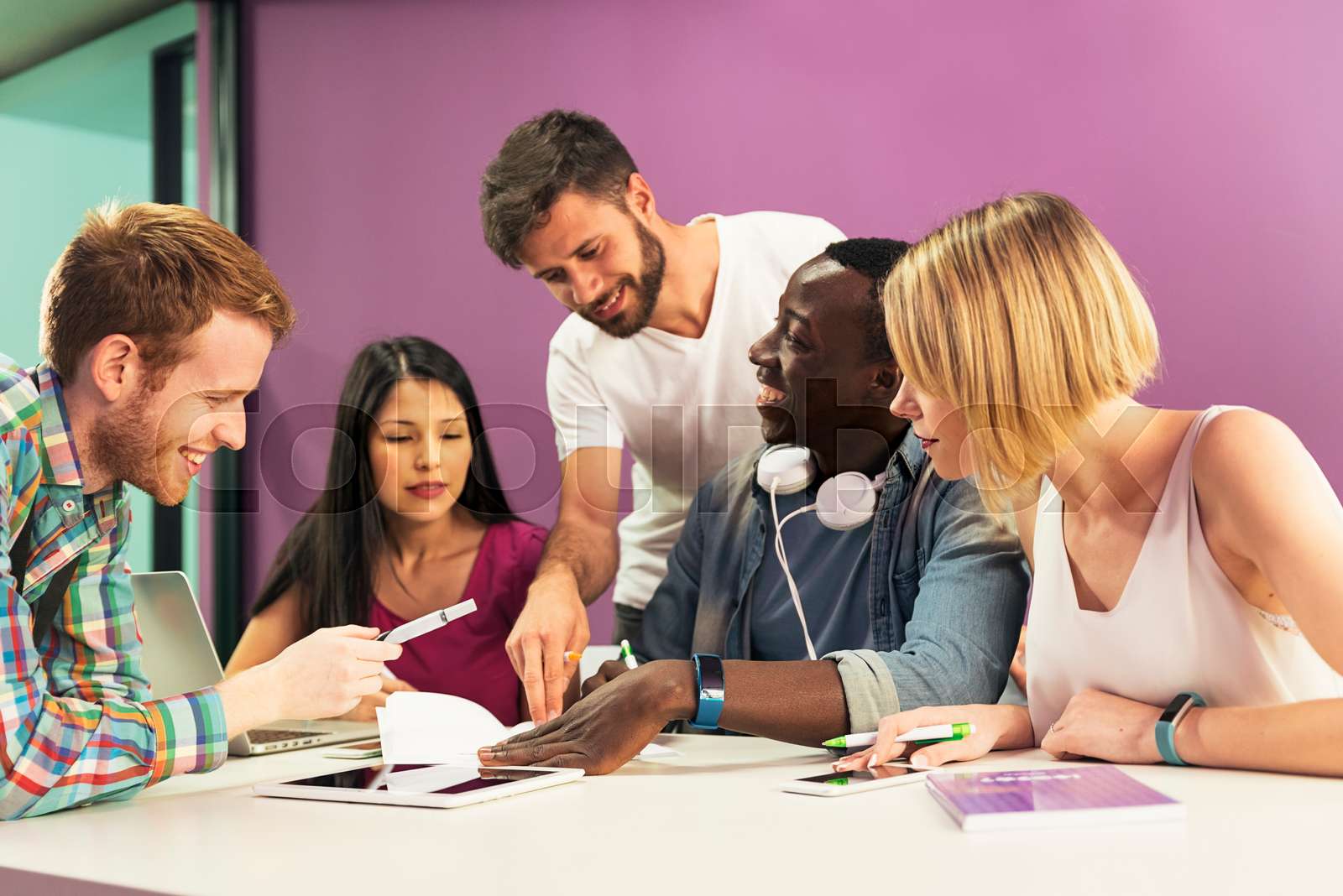 A students group learning at school academy. | Stock image | Colourbox