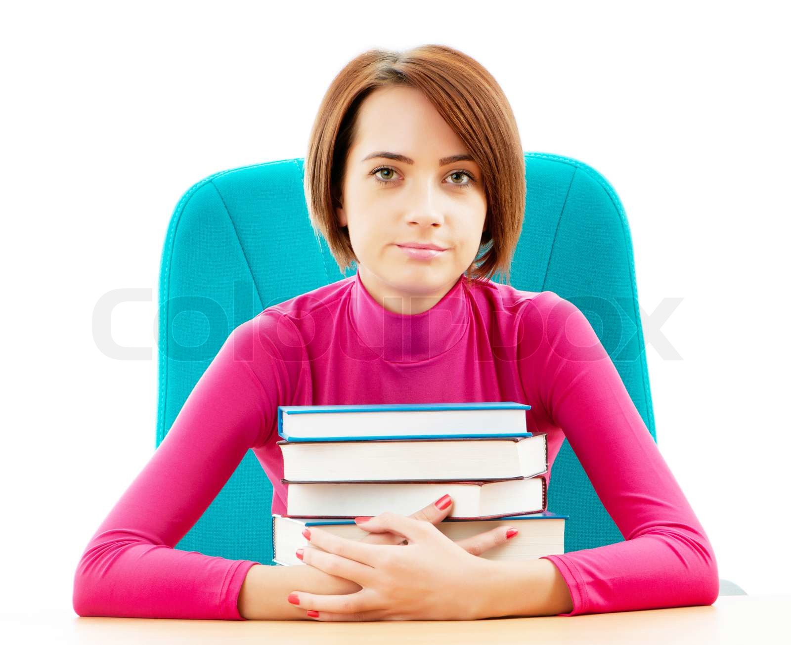 Junge Studentin mit vielen studieren Bücher | Stock Bild | Colourbox