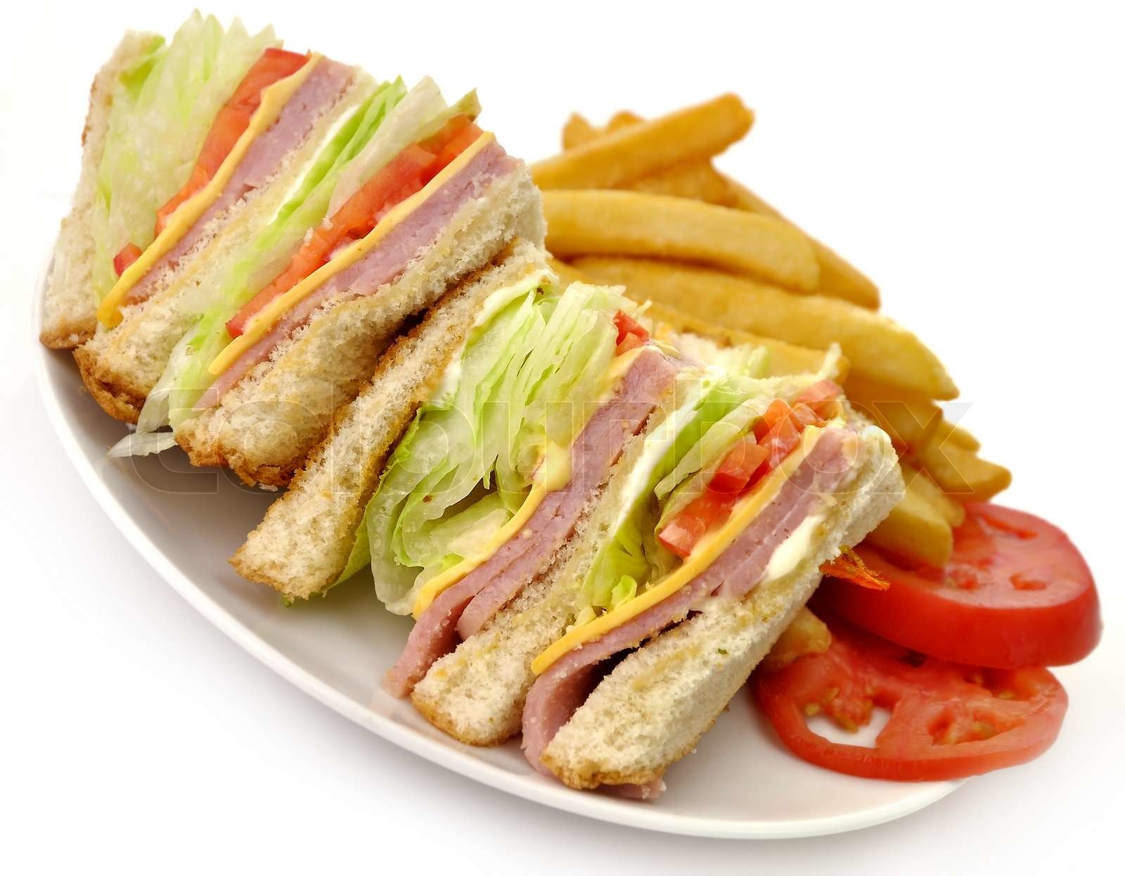 Kalkun eller skinke Club sandwich og pommes frites | Stock foto | Colourbox