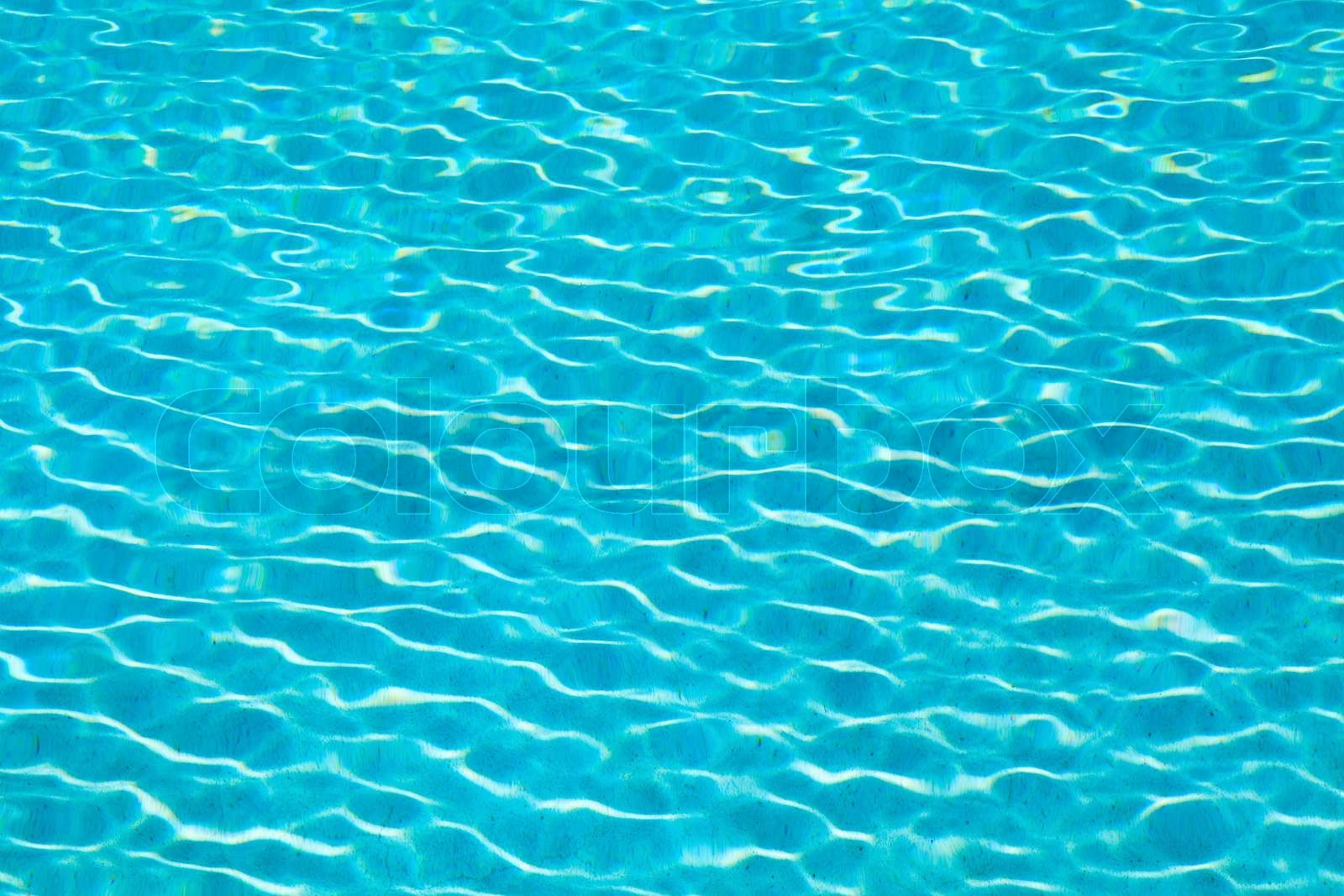 Close-up of turquoise water in a swimming pool | Stock image | Colourbox