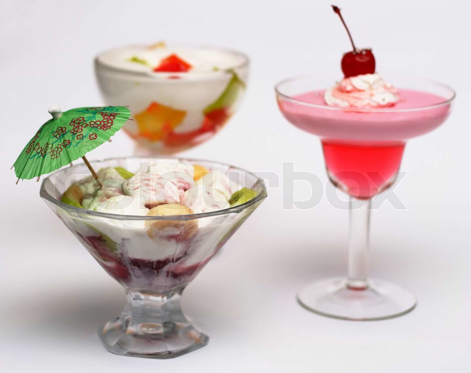 Three tasty cold desserts with ice-cream and fruit | Stock image ...
