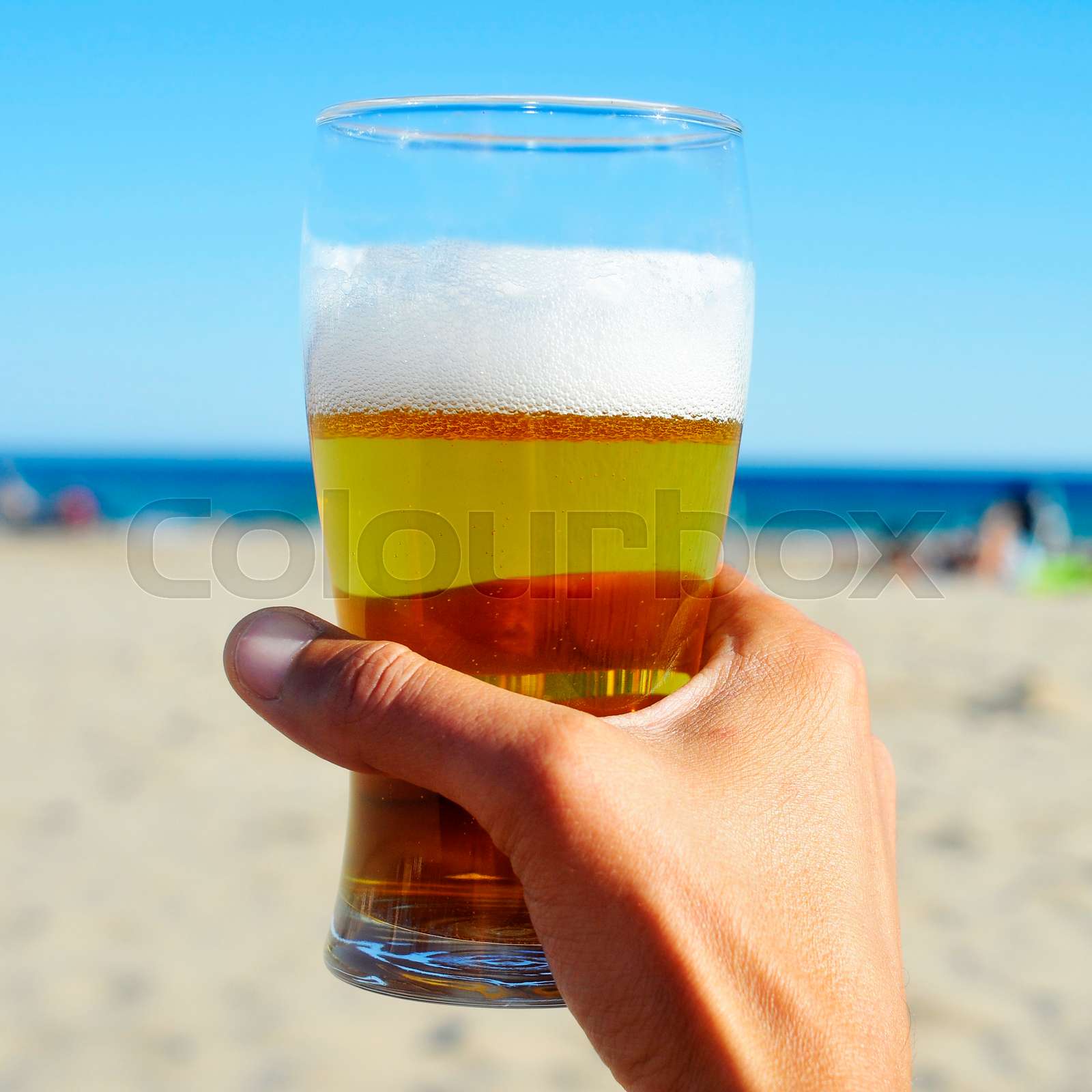 refreshing beer on the beach | Stock image | Colourbox