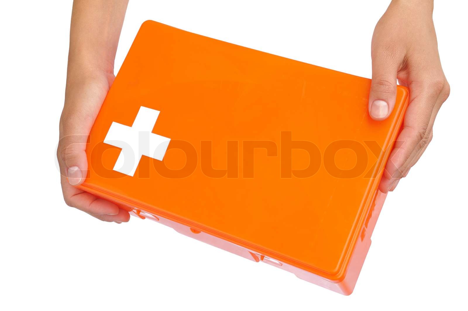 Hands of young woman holding first aid kit | Stock image | Colourbox
