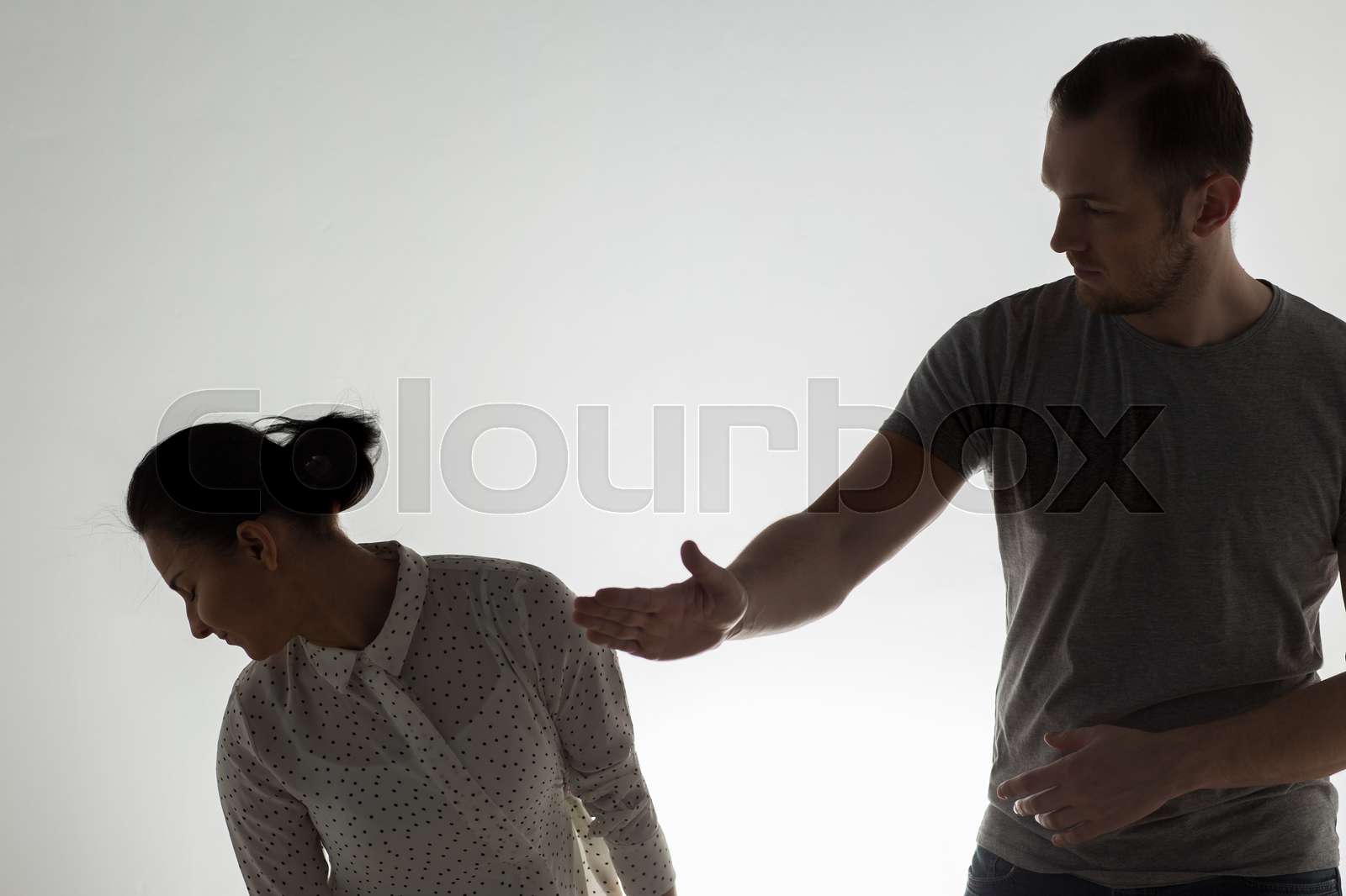 couple having fight and man slapping woman | Stock image | Colourbox