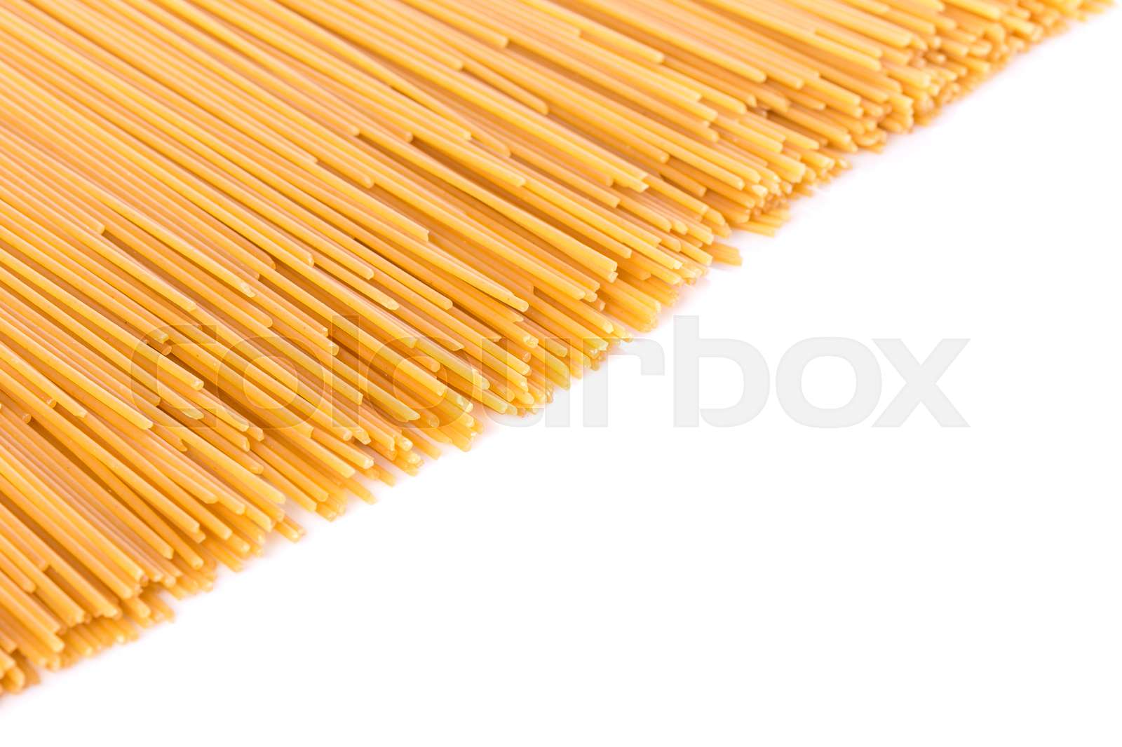 Yellow long spaghetti, Raw spaghetti. Studio shot isolated on white ...