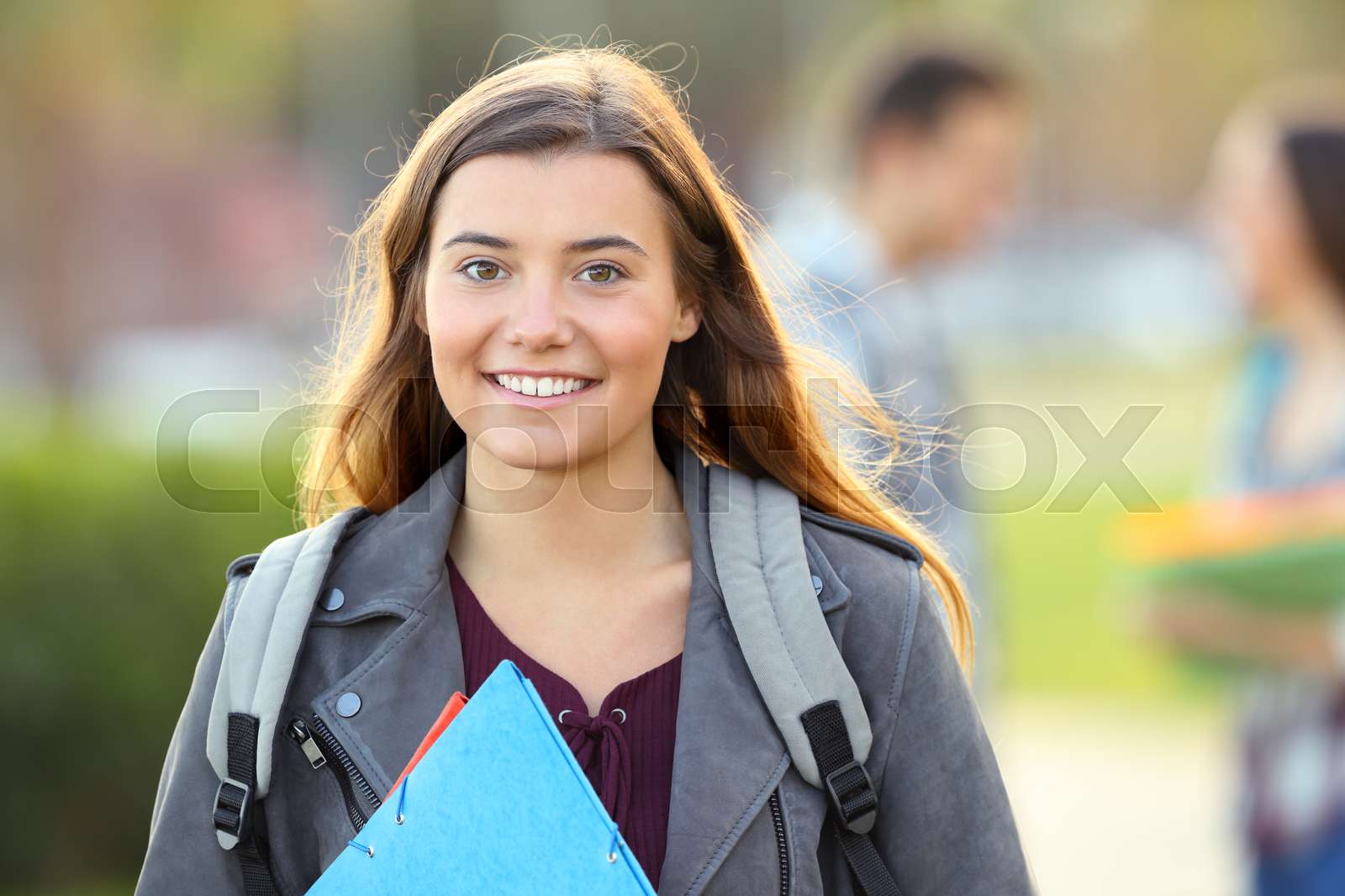 Student posing in an university campus | Stock image | Colourbox