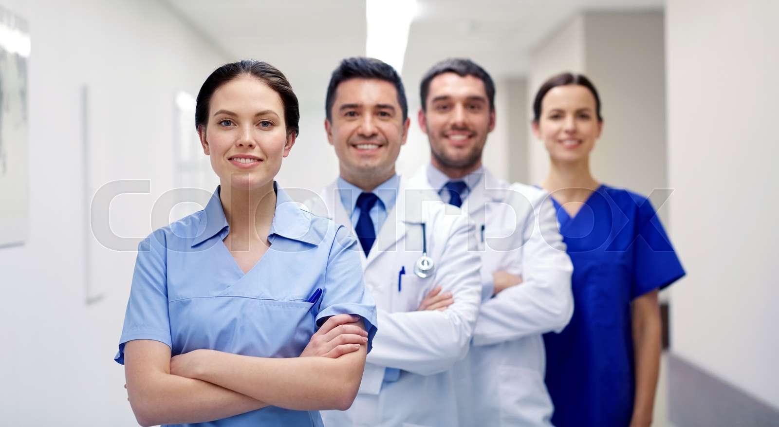 group of happy medics or doctors at hospital | Stock image | Colourbox