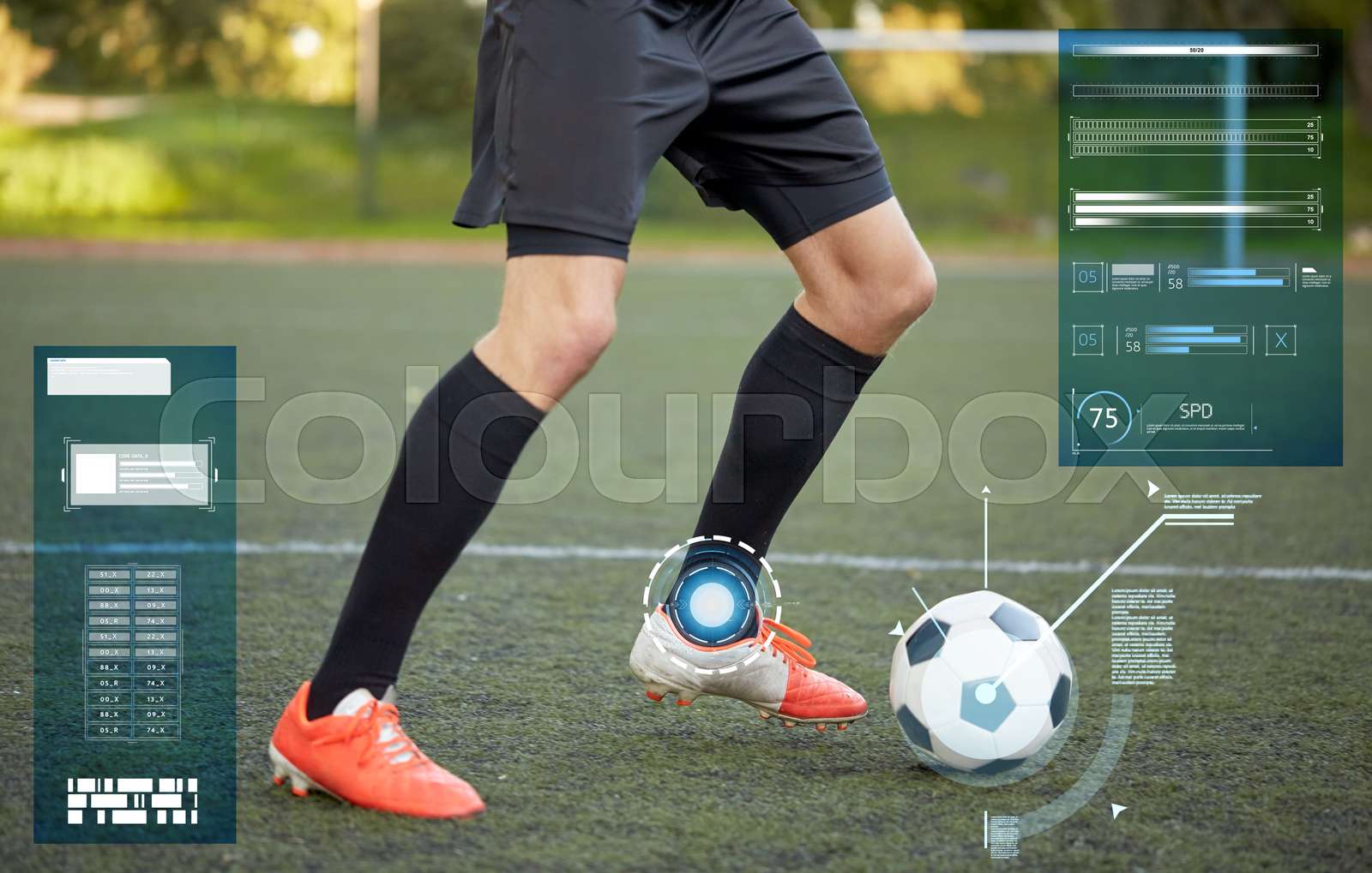 soccer player playing with ball on football field | Stock image | Colourbox