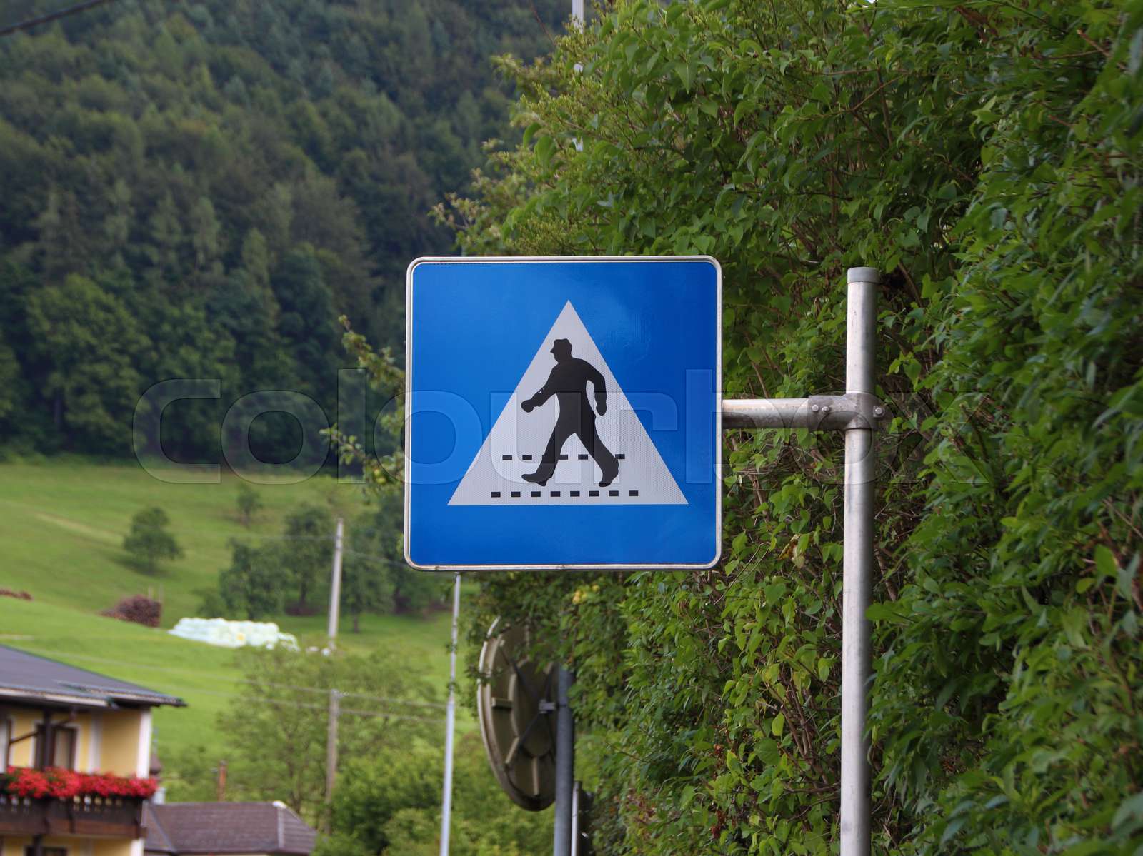 Pedestrian Sign of Man with Hat at Crossover | Stock image | Colourbox