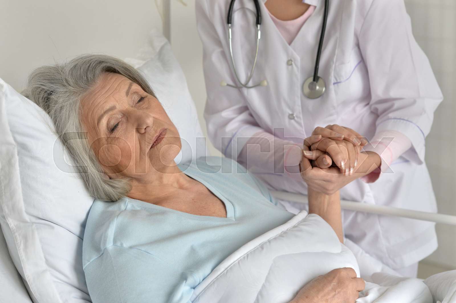 doctor taking care of patient | Stock image | Colourbox