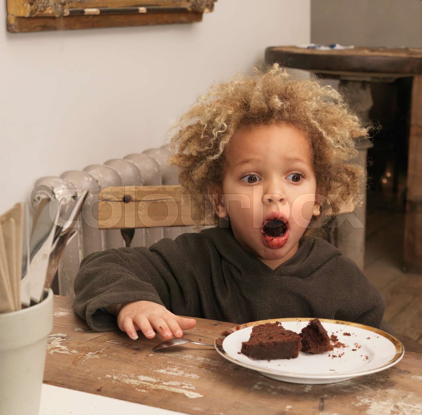 Kid Eating Chocolate Cake