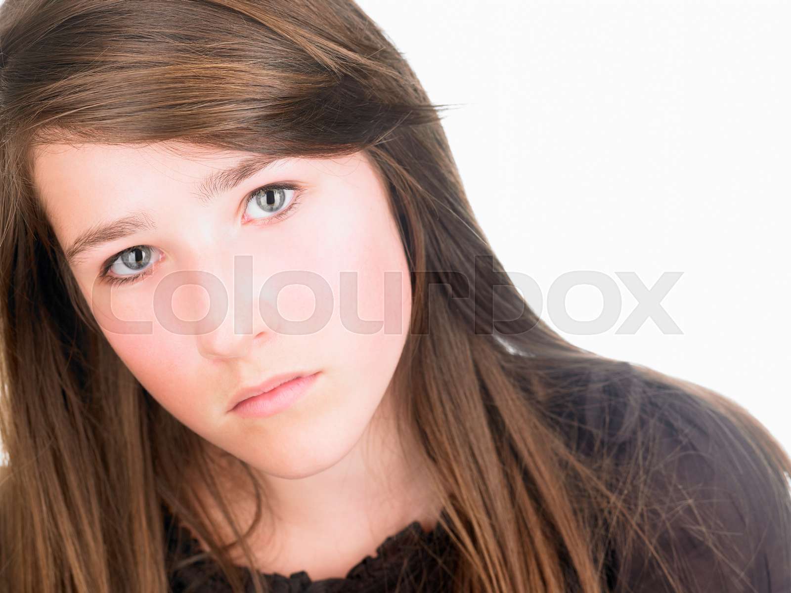 Girl looking at camera, seriously | Stock image | Colourbox