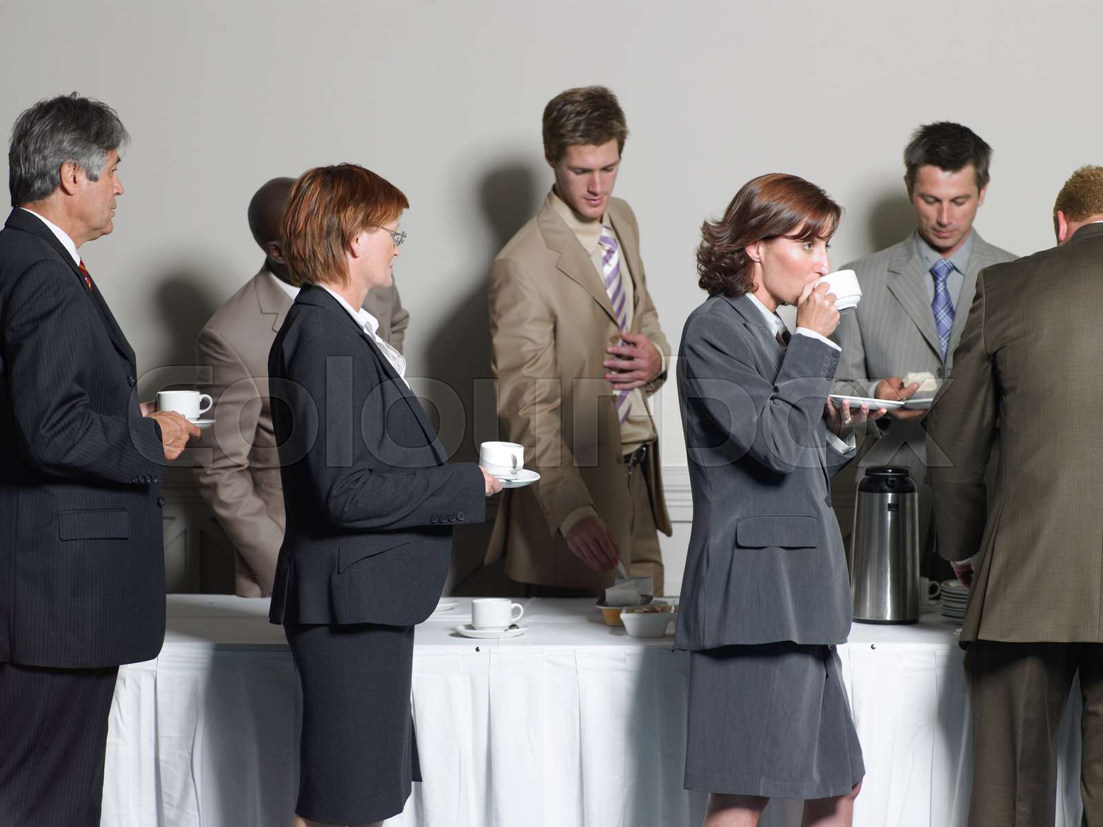 Office workers having a coffee break | Stock image | Colourbox
