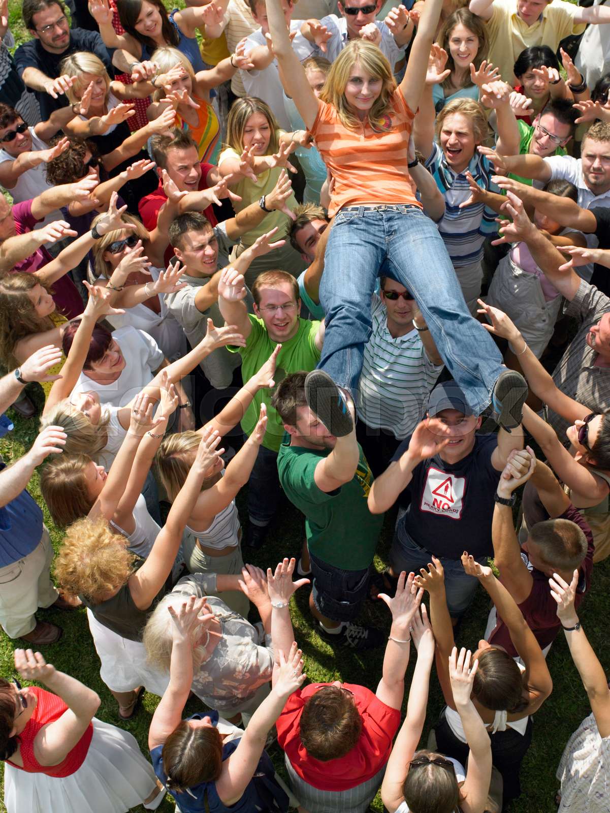 Crowd carrying woman | Stock image | Colourbox