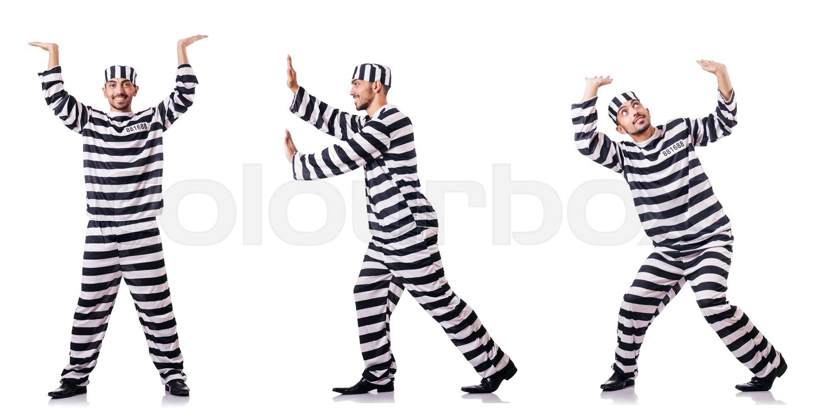 Convict criminal in striped uniform | Stock image | Colourbox