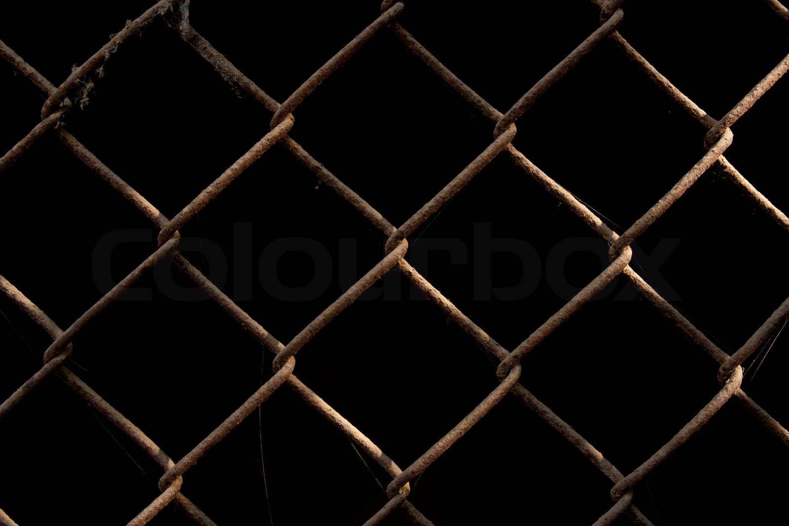 rustne metal gitter på en sort baggrund | Stock foto | Colourbox