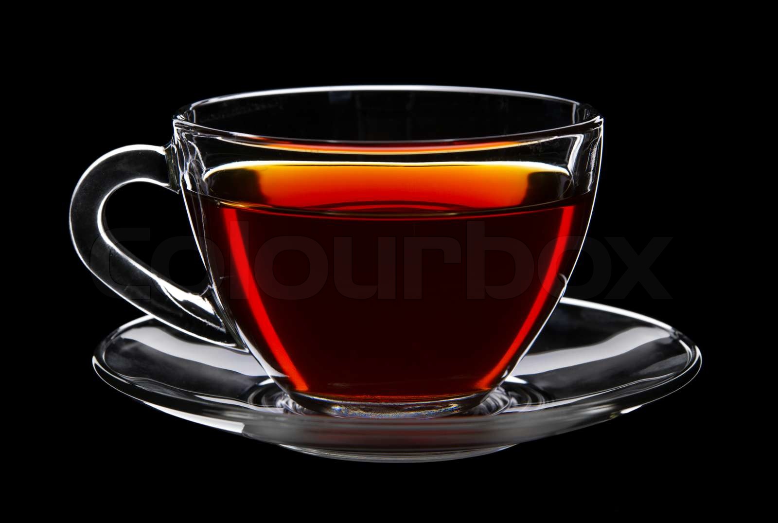 Cup of black tea isolated on black background | Stock image | Colourbox