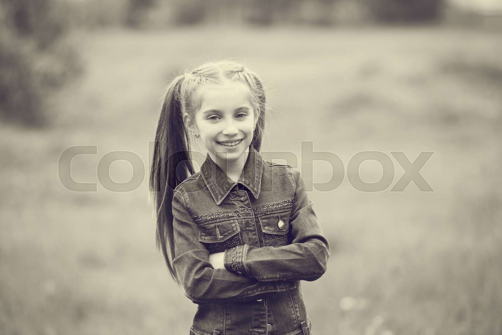 lovely little girl with two tails | Stock image | Colourbox