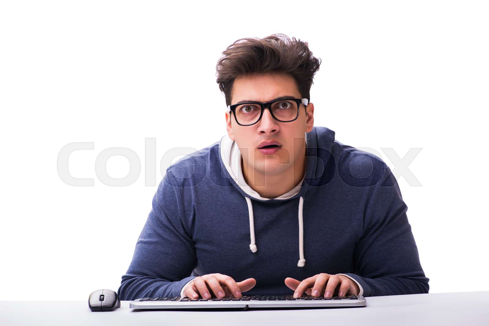 Funny nerd man working on computer isolated on white | Stock image ...