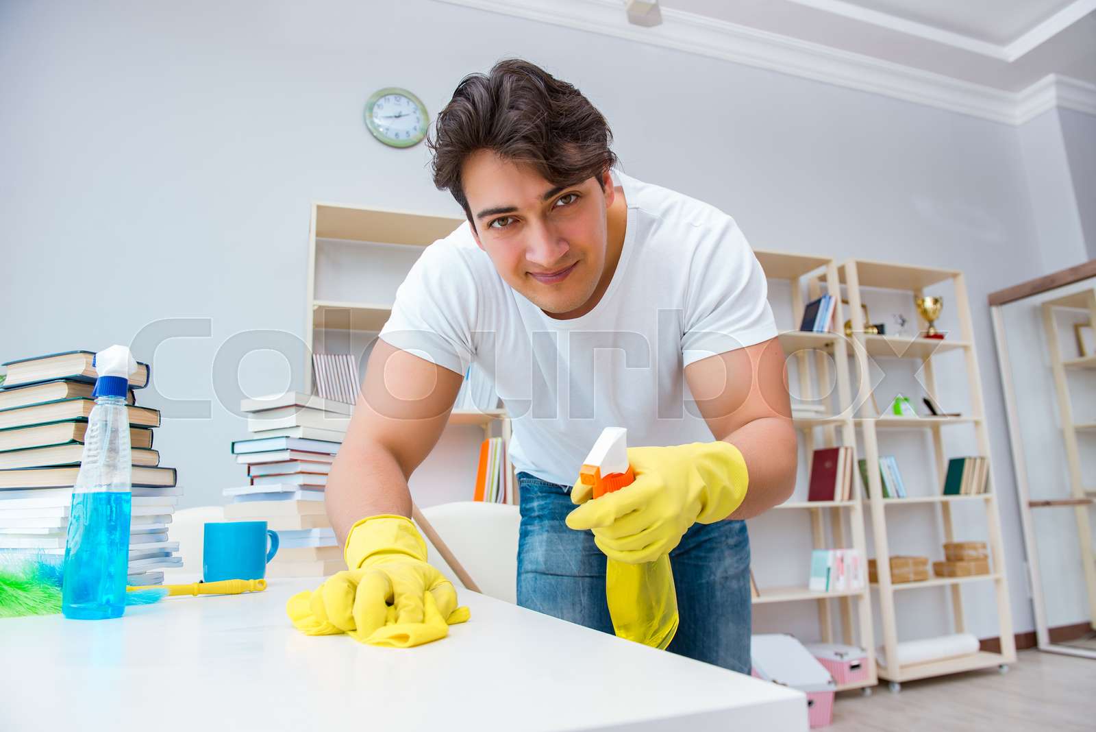 Man doing cleaning at home | Stock image | Colourbox